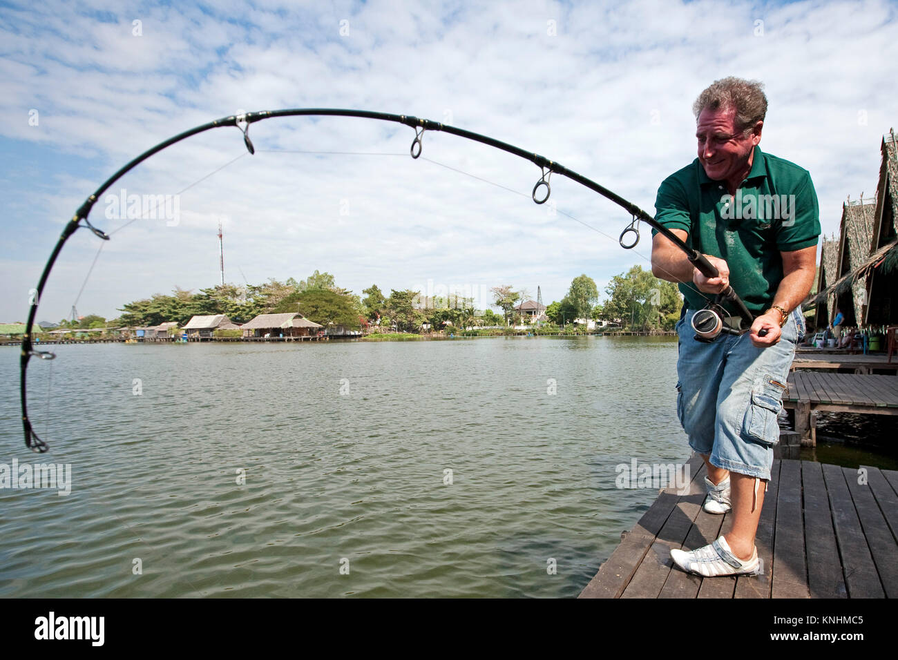 Fishing pose hi-res stock photography and images - Alamy