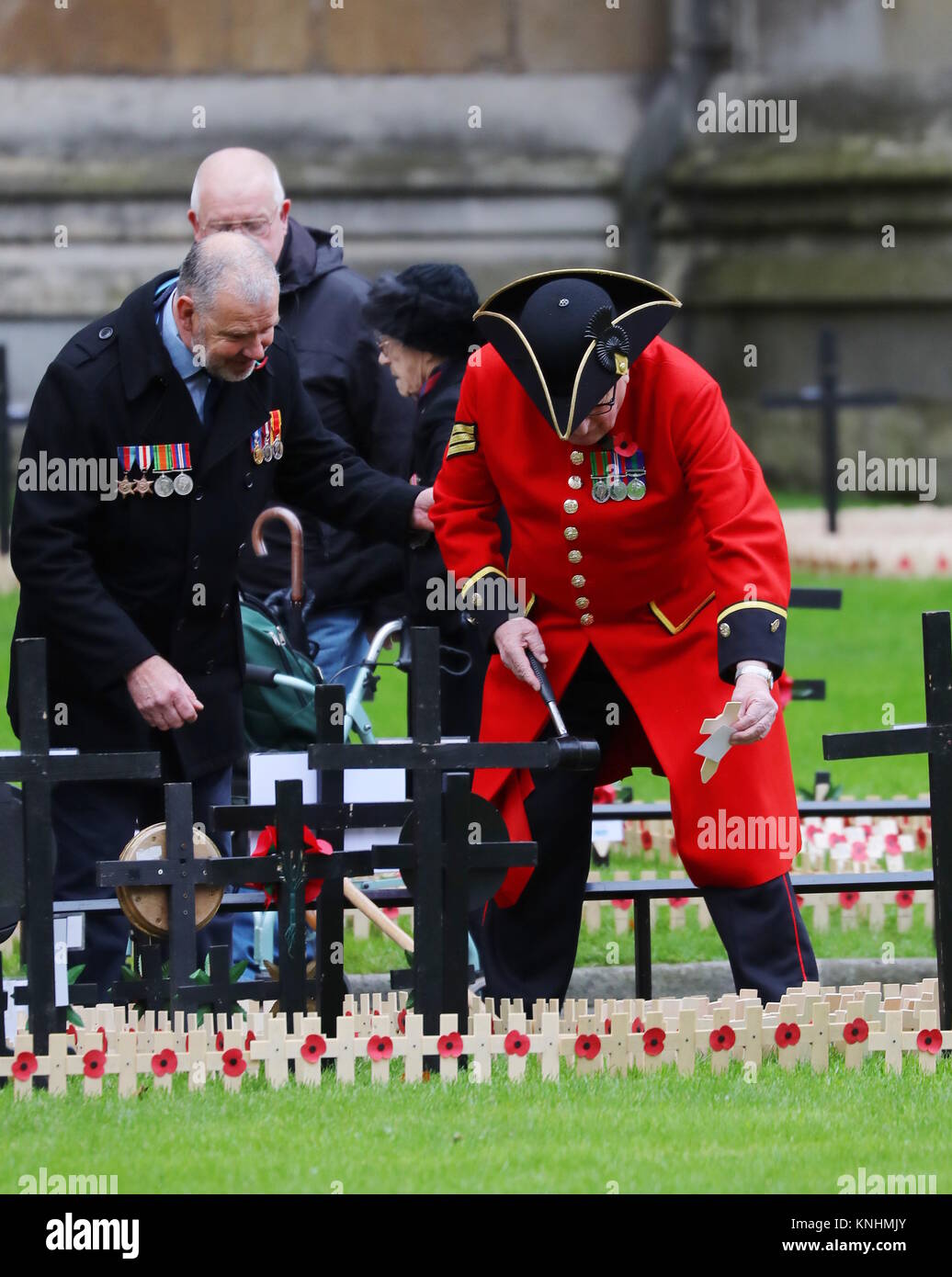 His Royal Highness Prince Harry lays a Cross of Remembrance in front of ...