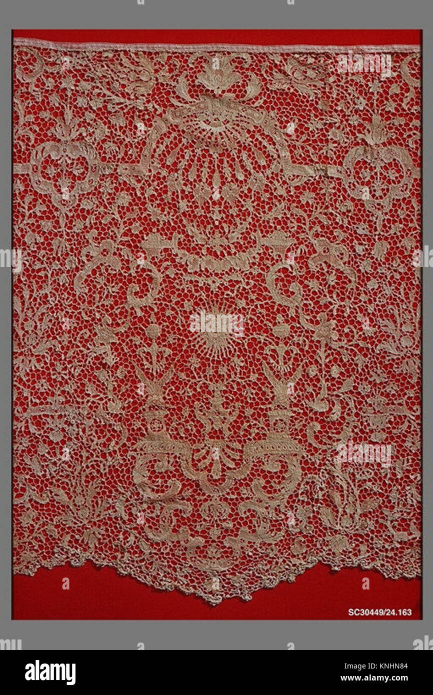 This flounce, a decorative trim, showcases fine textile work, often ...