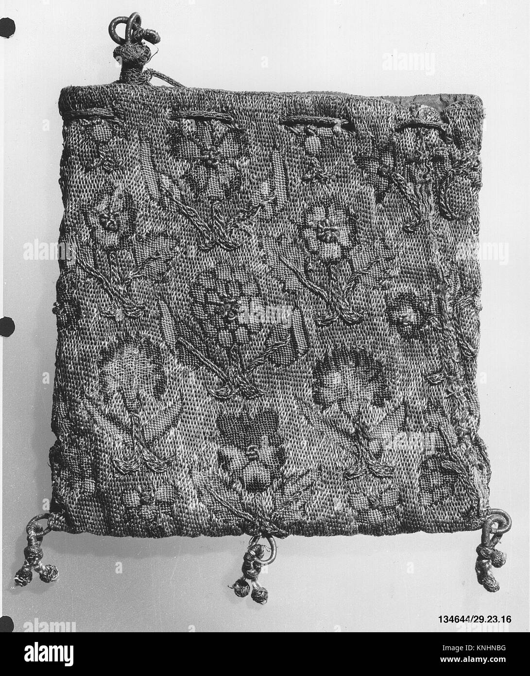 This bag, dating to a historical period, features functional and ...