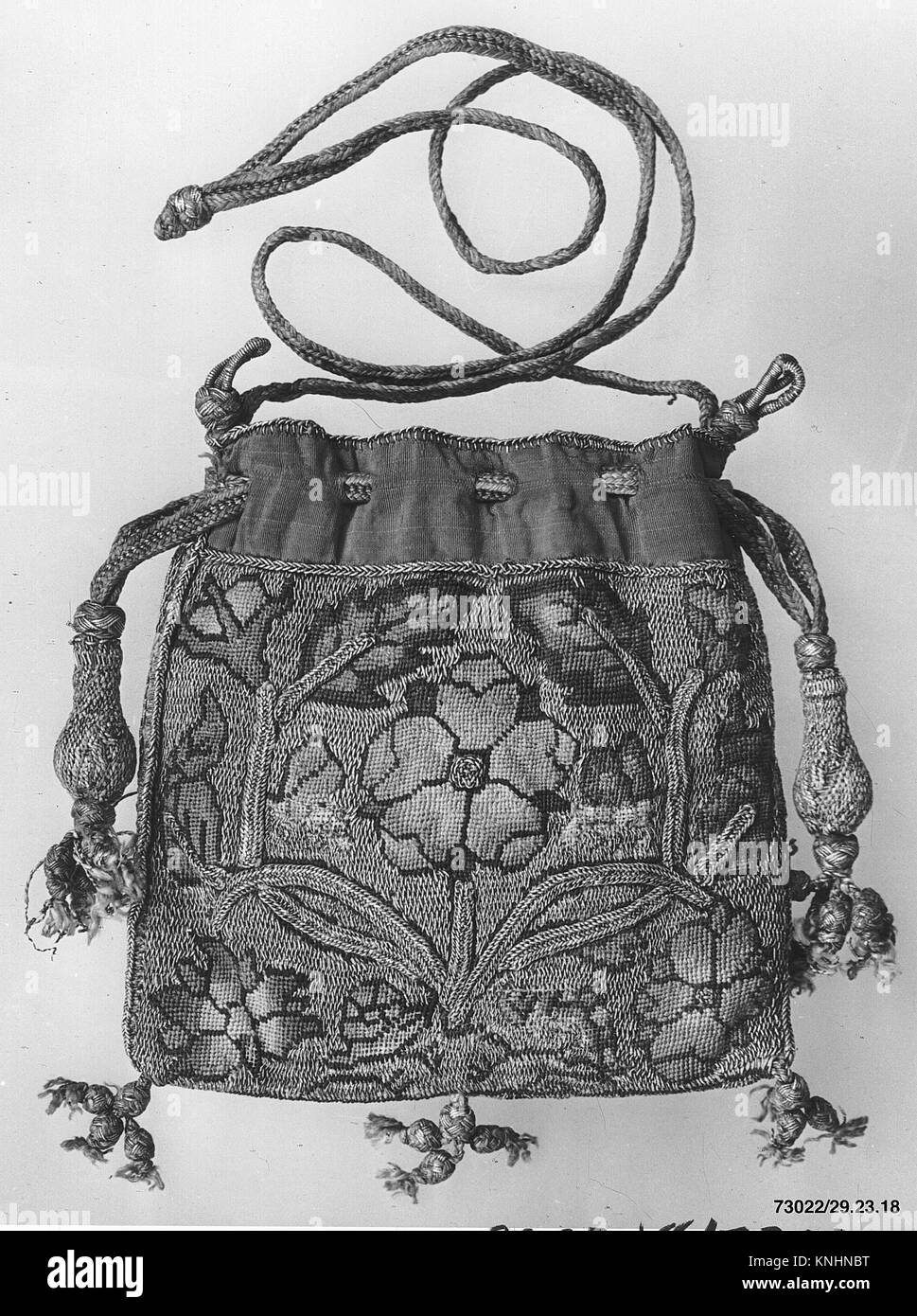 This historical bag is a finely crafted accessory reflecting the ...