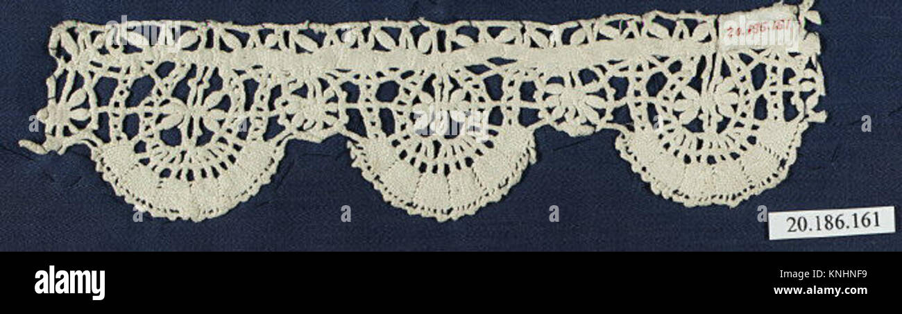 This intricate edging design highlights detailed craftsmanship, often ...