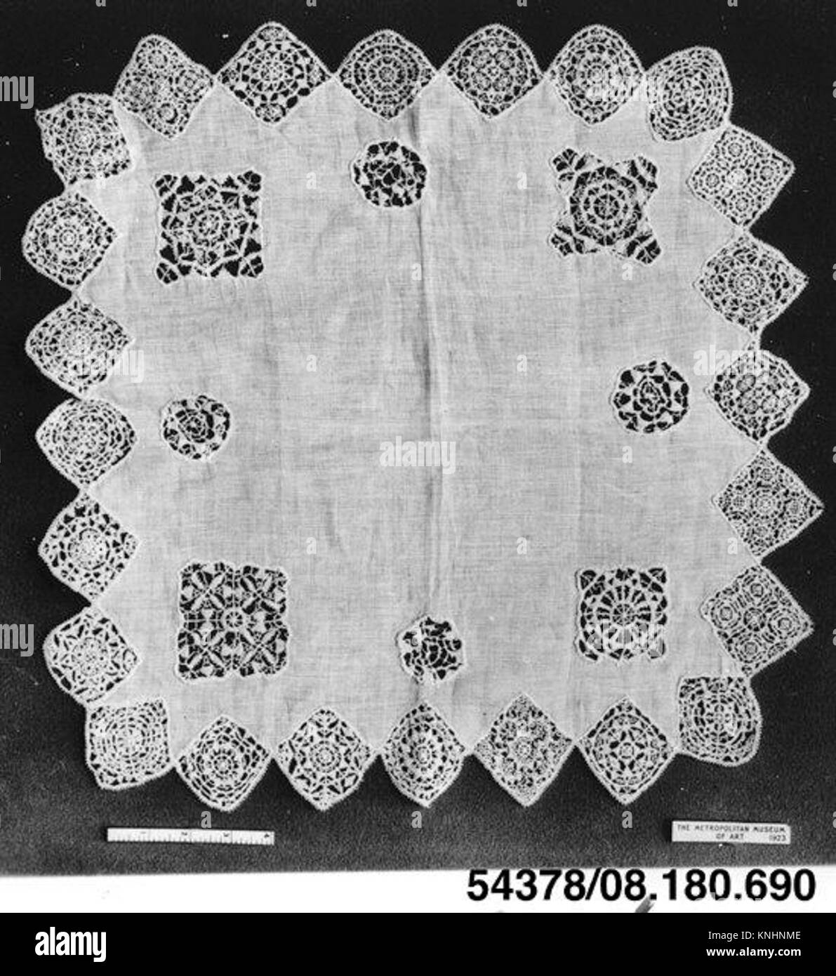 An intricately designed handkerchief, representing historical fabric ...