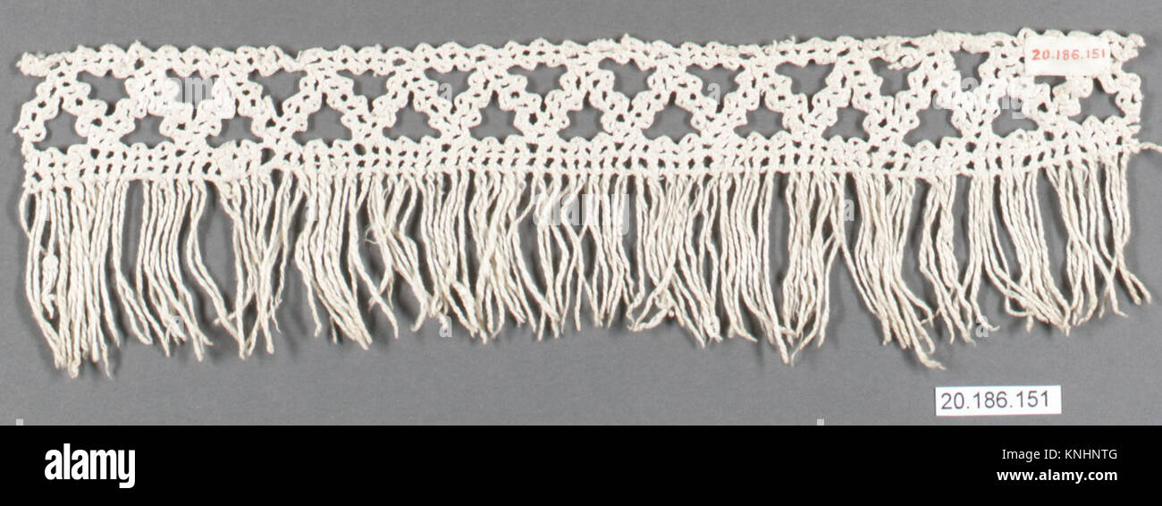 A textile edging with fringe, demonstrating ornamental craftsmanship in ...