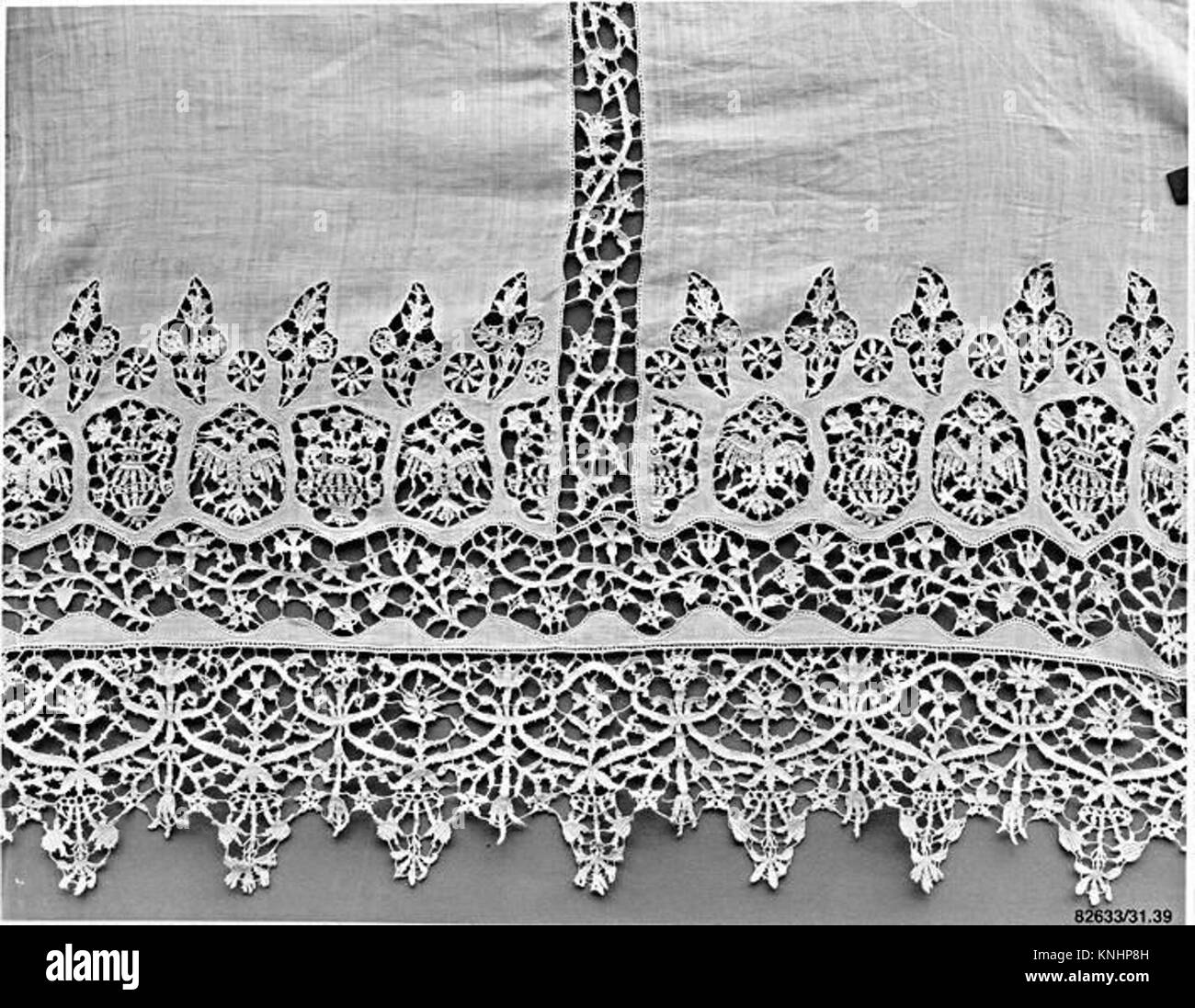 An alb, a white liturgical garment worn by clergy during religious ...