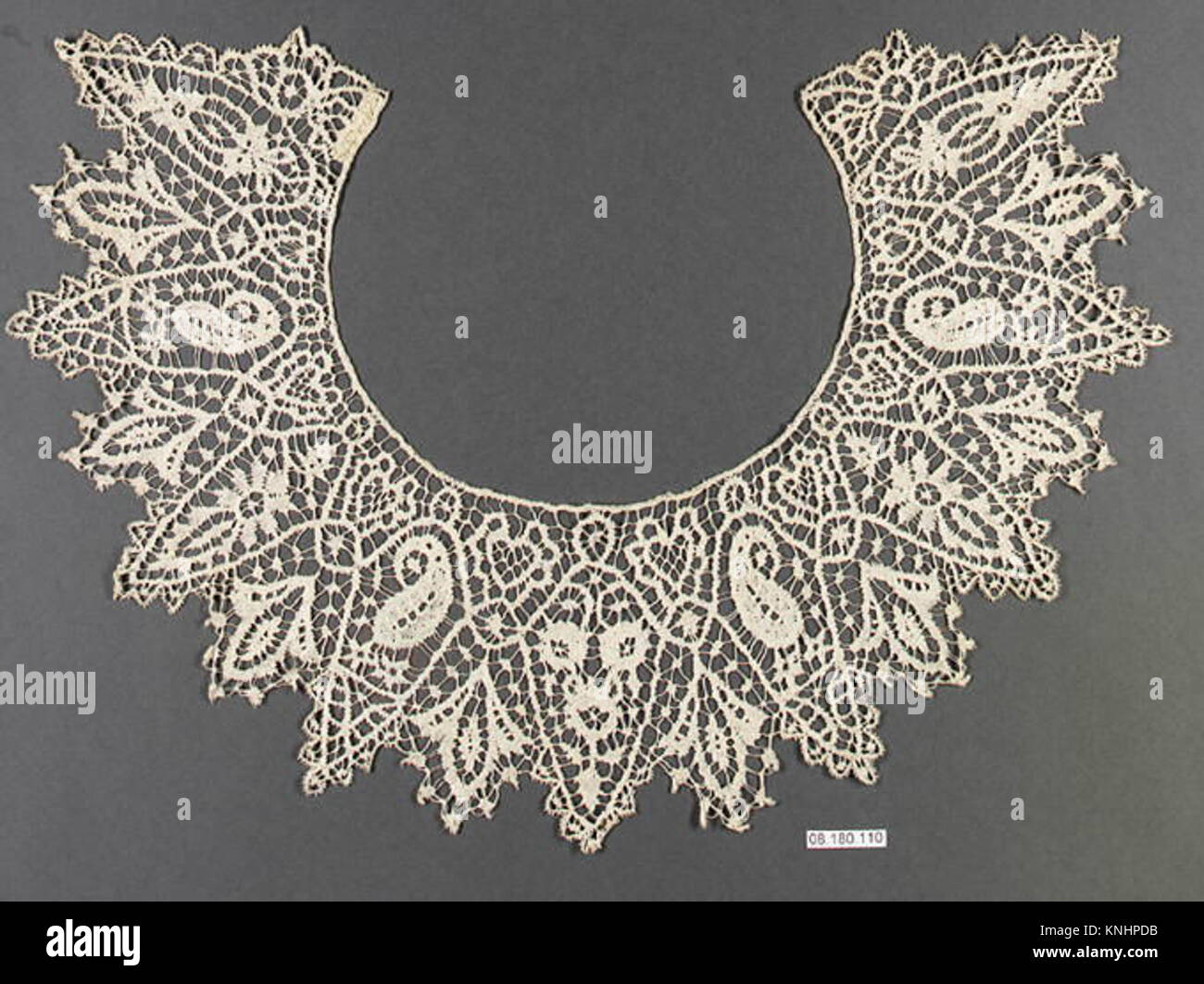This collar, crafted from fine materials, exemplifies the ornamental ...