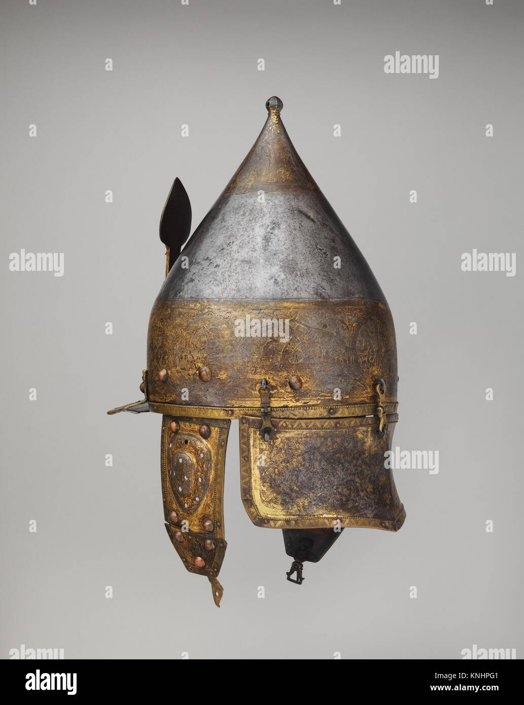 This helmet is a significant example of ancient military or ceremonial ...