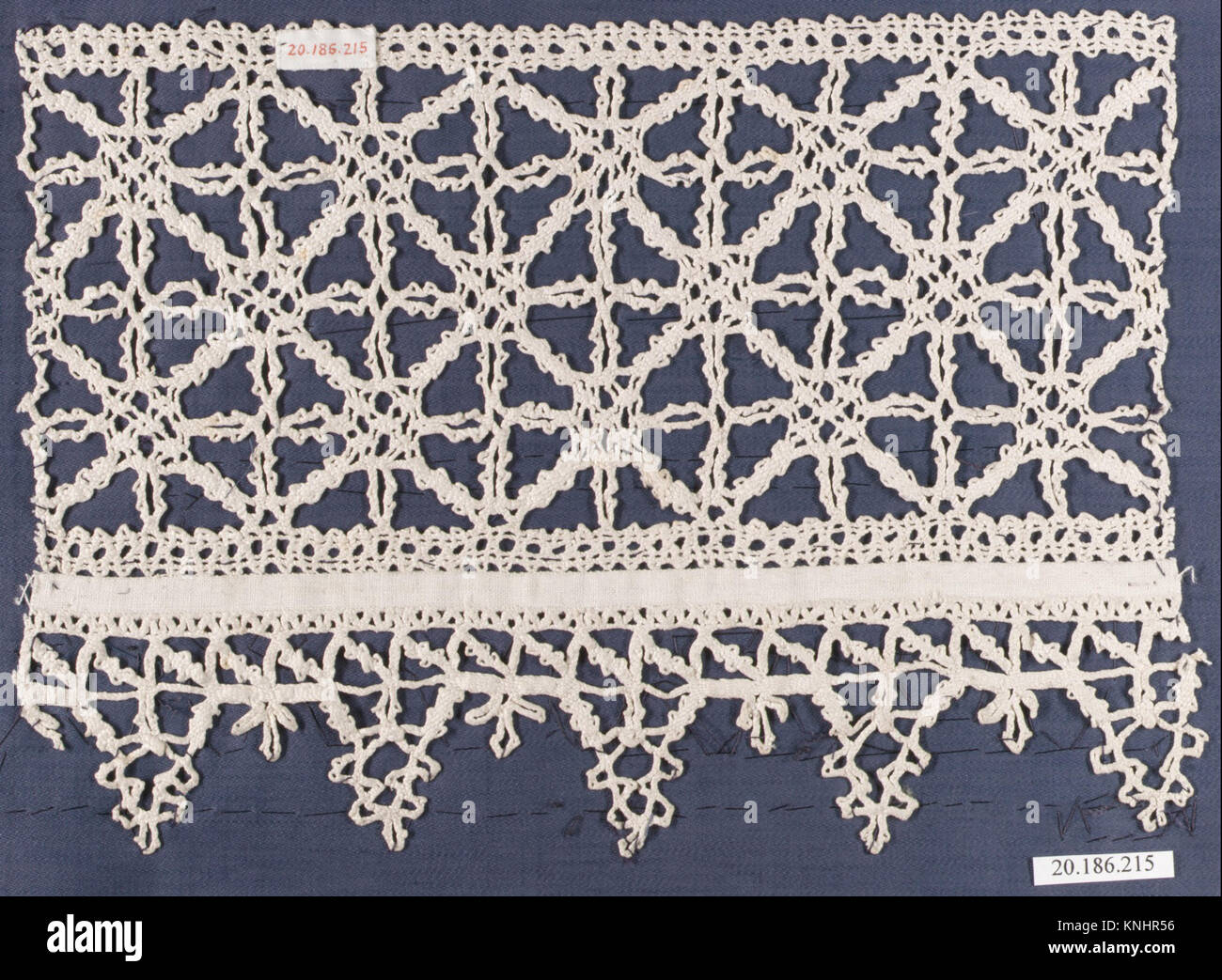 This piece of edging and insertion showcases intricate textile design ...