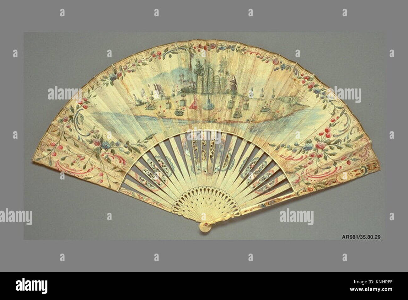 This fan, made of fine materials with intricate designs, represents the ...