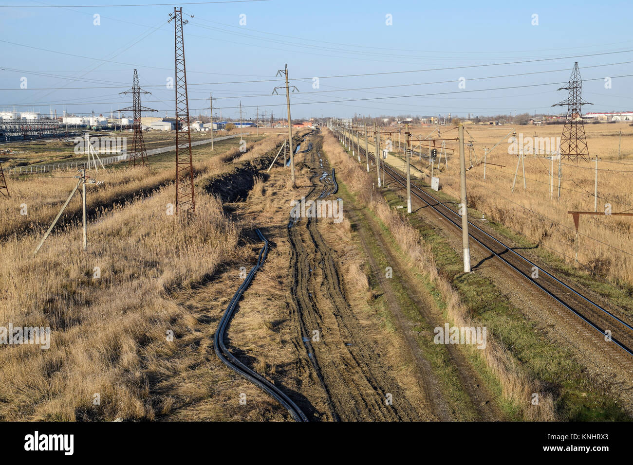 Plot railway. Top view on the rails. High-voltage power lines for ...