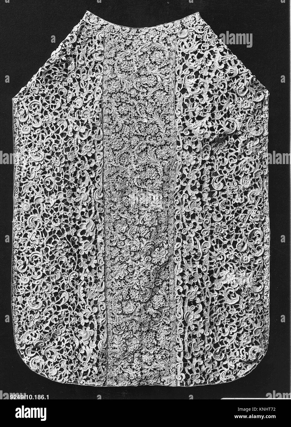 A chasuble liturgical vestment decorated with religious symbols ...