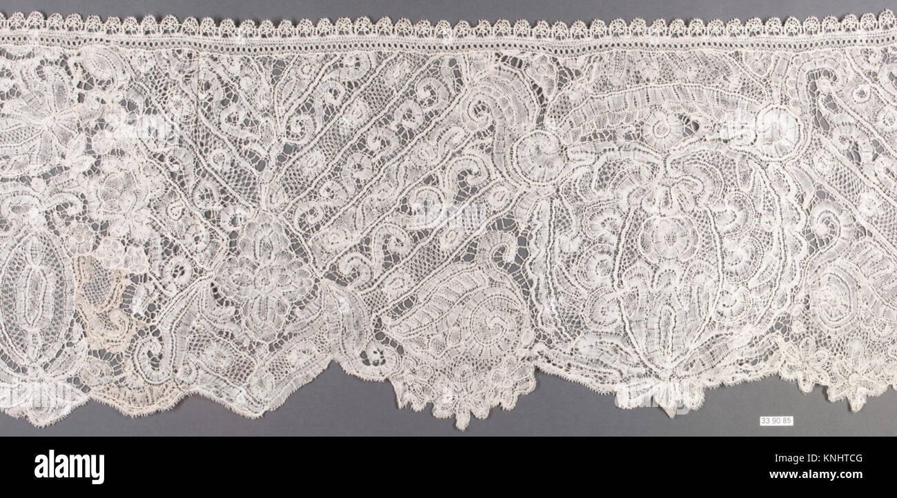 This flounce is a textile piece featuring intricate fabric design and ...