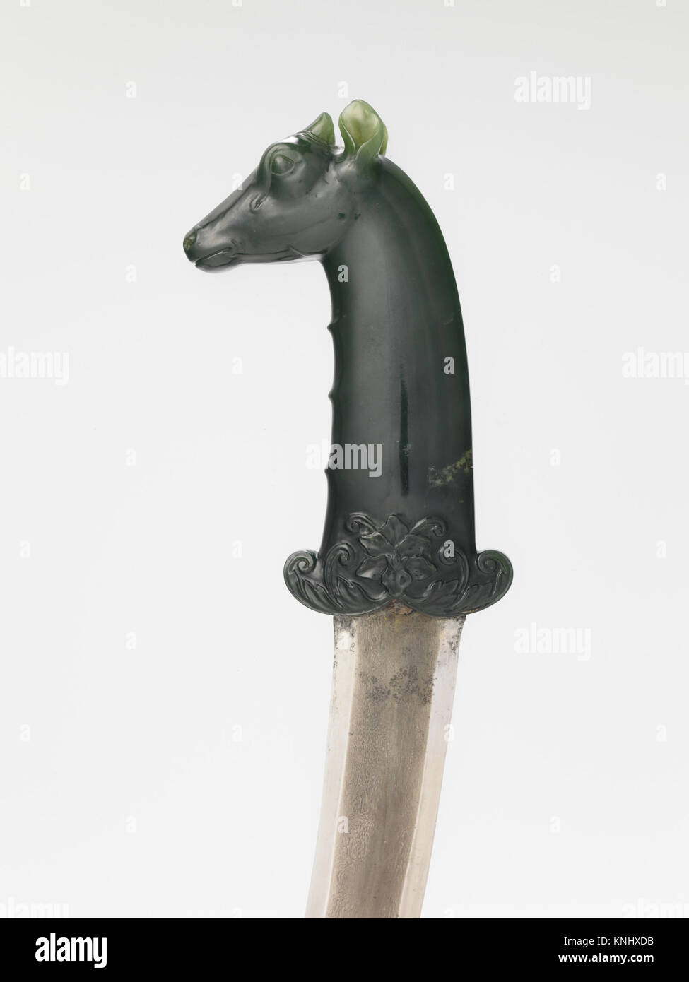 This dagger features a hilt shaped like a blue bull (nilgai), combining ...