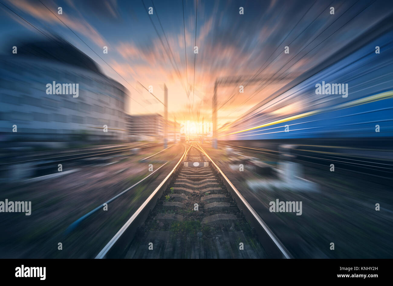 Railway station with motion blur effect. Blurred railroad. Industrial ...