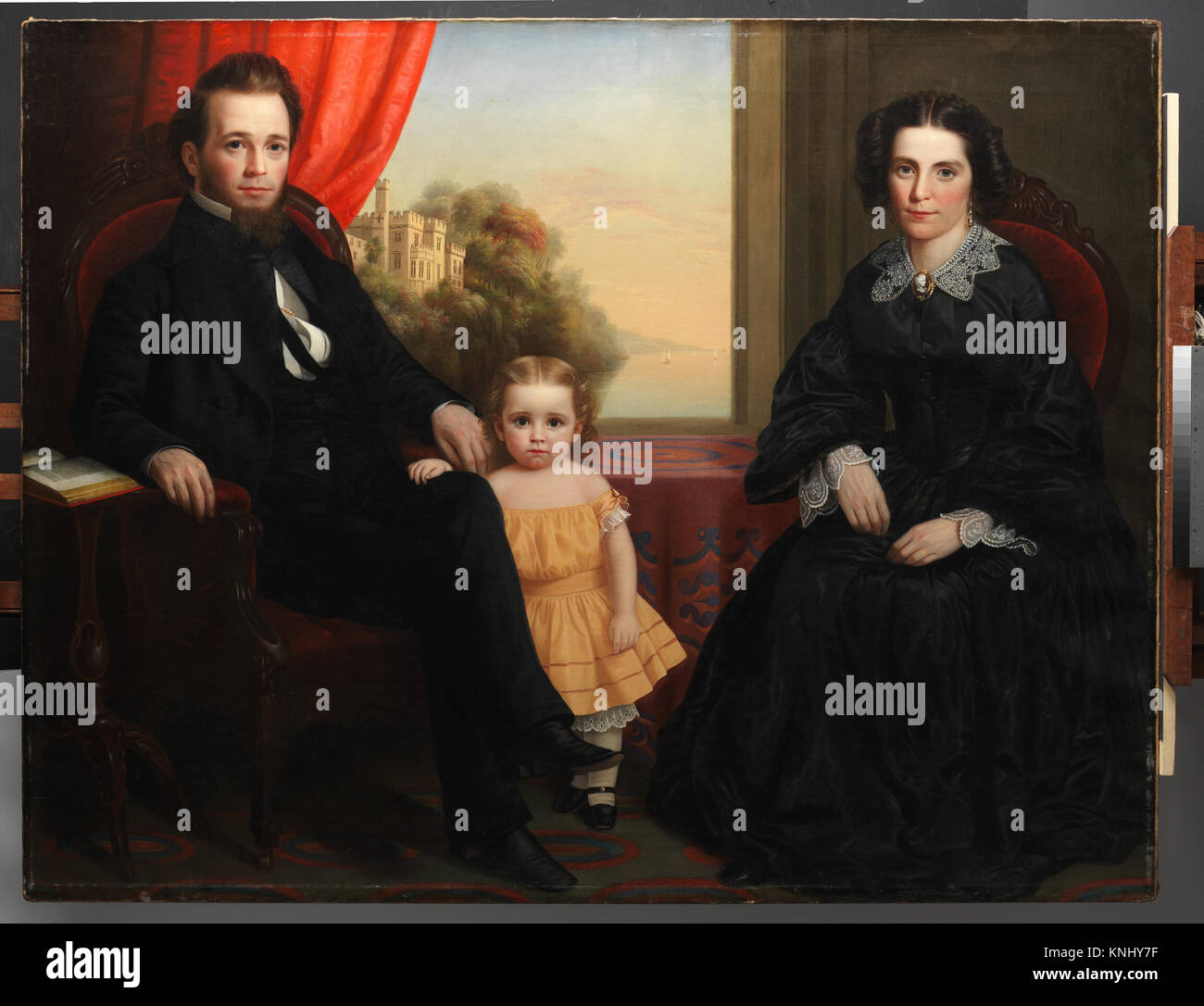 This oil painting, titled 'A Family Group,' dates from circa 1850 and ...