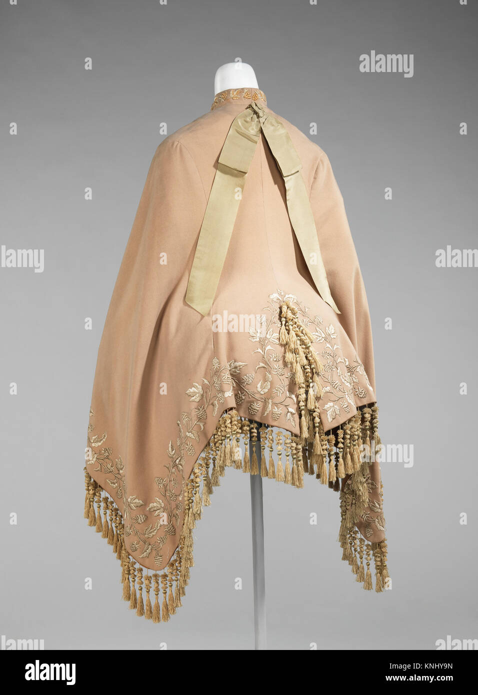 This dolman is an elegant example of historical outerwear, featuring ...