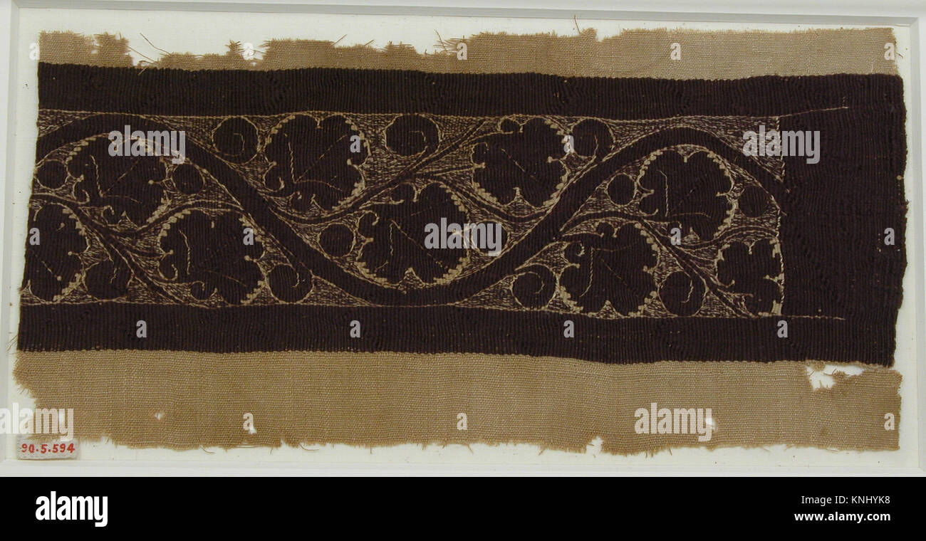 Decorative band with vine scroll design, exemplifying intricate ...