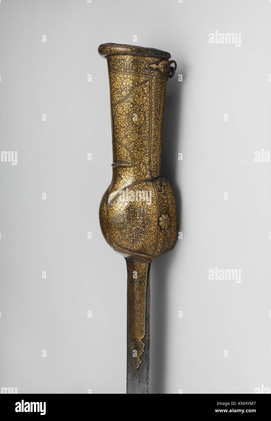 This gauntlet sword, known as a *pata*, is a distinctive weapon from ...