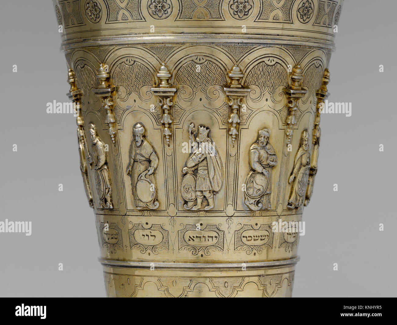 A cup with a cover featuring Hebrew inscriptions, likely a ceremonial ...