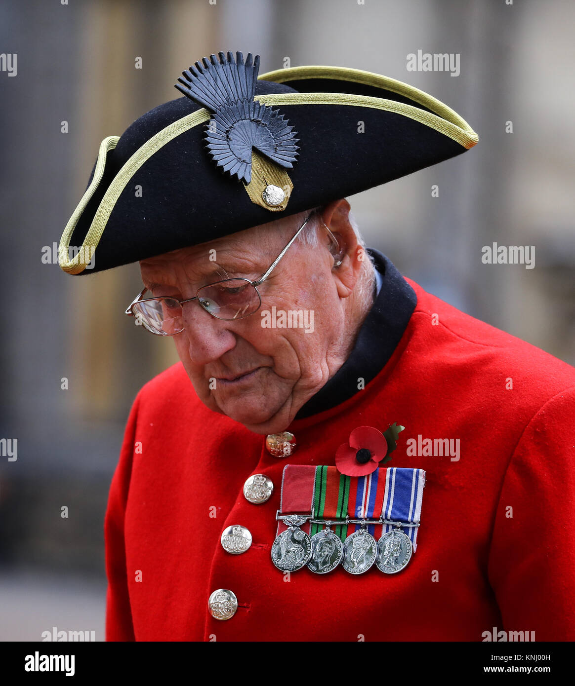 His Royal Highness Prince Harry lays a Cross of Remembrance in front of ...