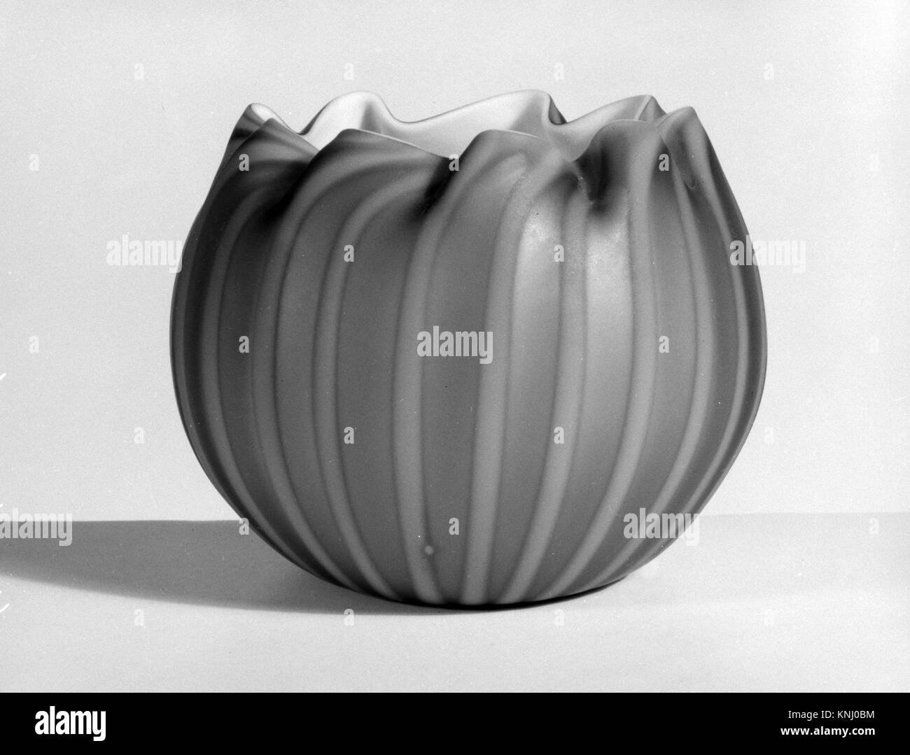 This British blown glass bowl from around 1885 features red and white ...