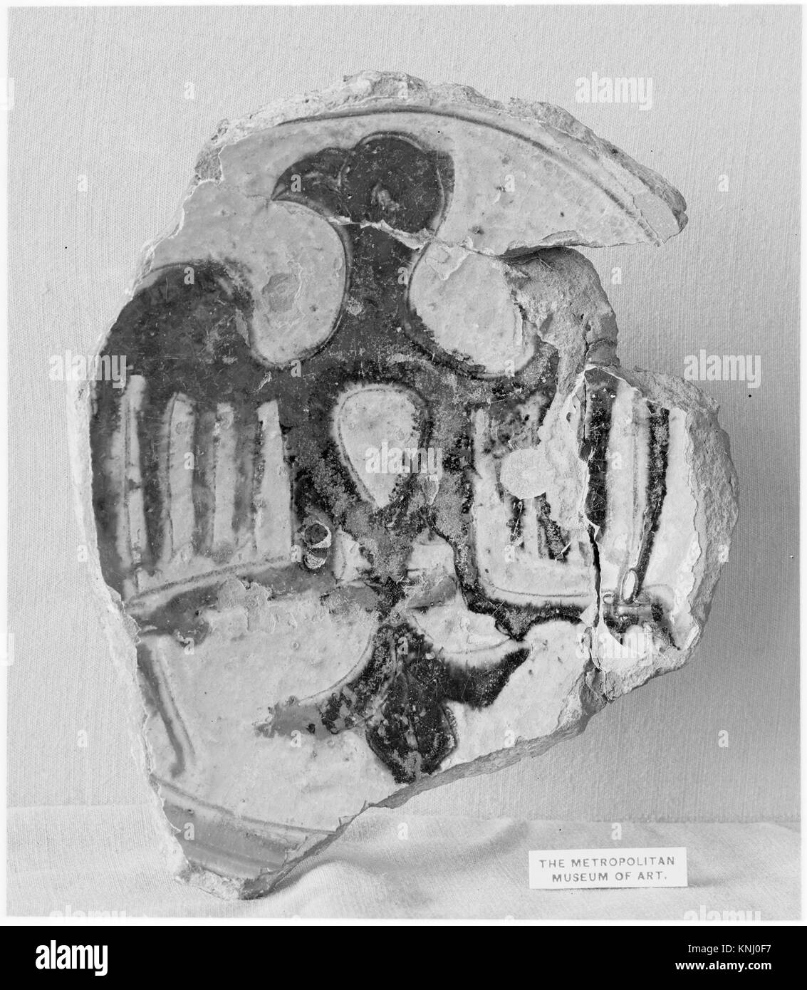 This fragment is a museum artifact demonstrating historical material ...