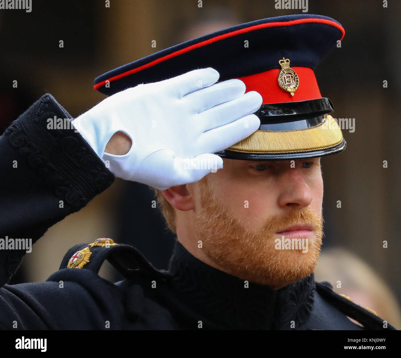 His Royal Highness Prince Harry lays a Cross of Remembrance in front of ...