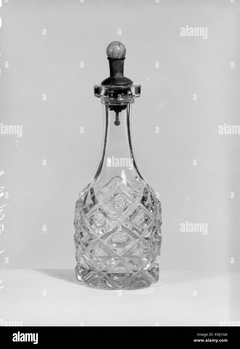 This pressed glass bitters bottle from the 1850s–1860s features a ...