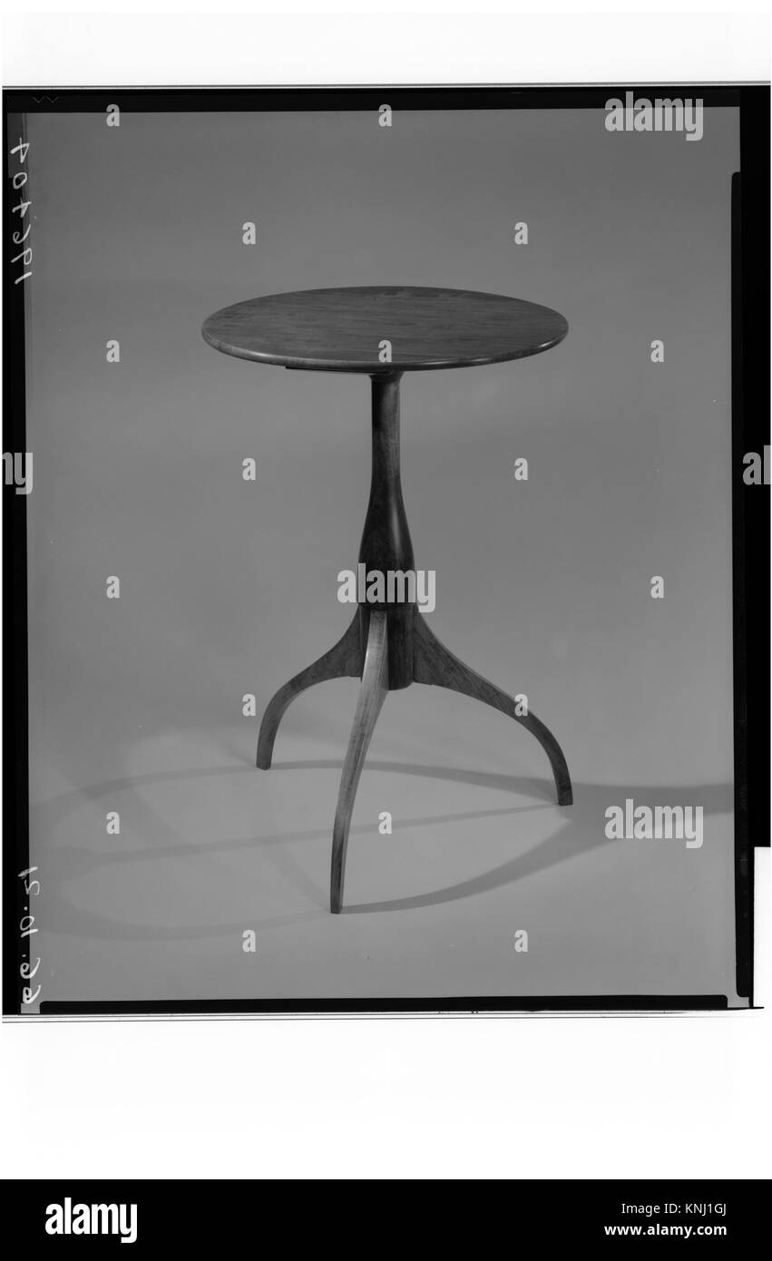 This Shaker candle stand, crafted between 1800 and 1840, is made of ...