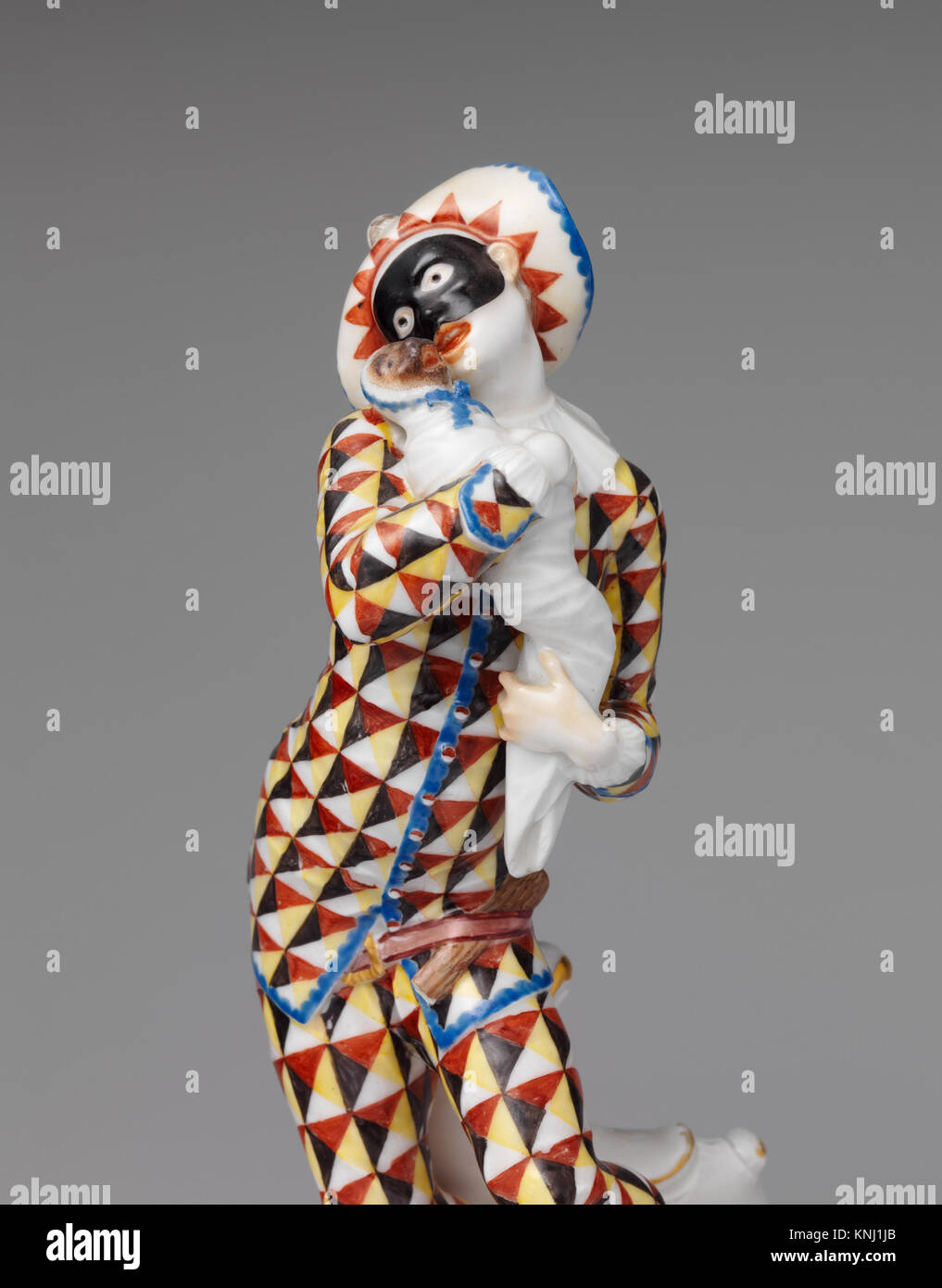 Painting of a harlequin from Italian commedia dell'arte, showing ...
