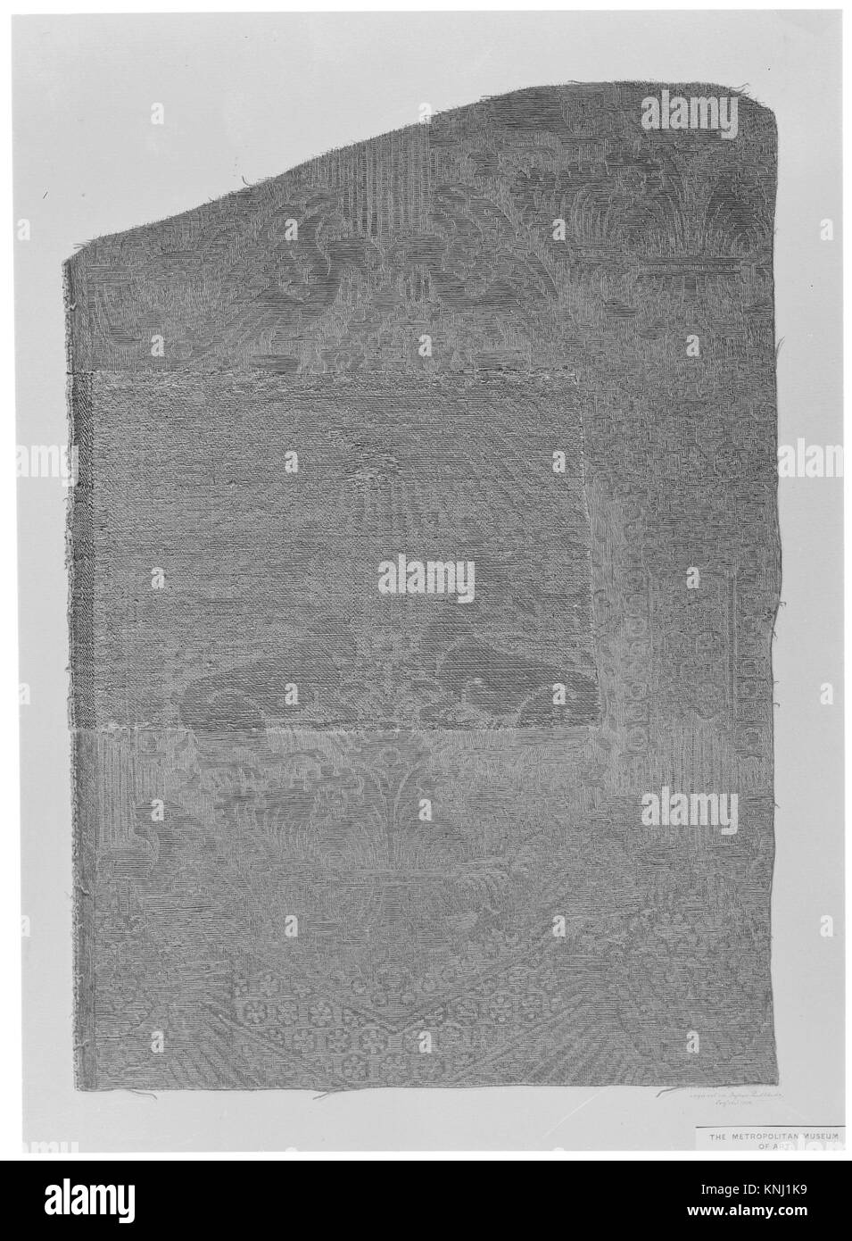 This brocade textile features intricate patterns and fine craftsmanship ...