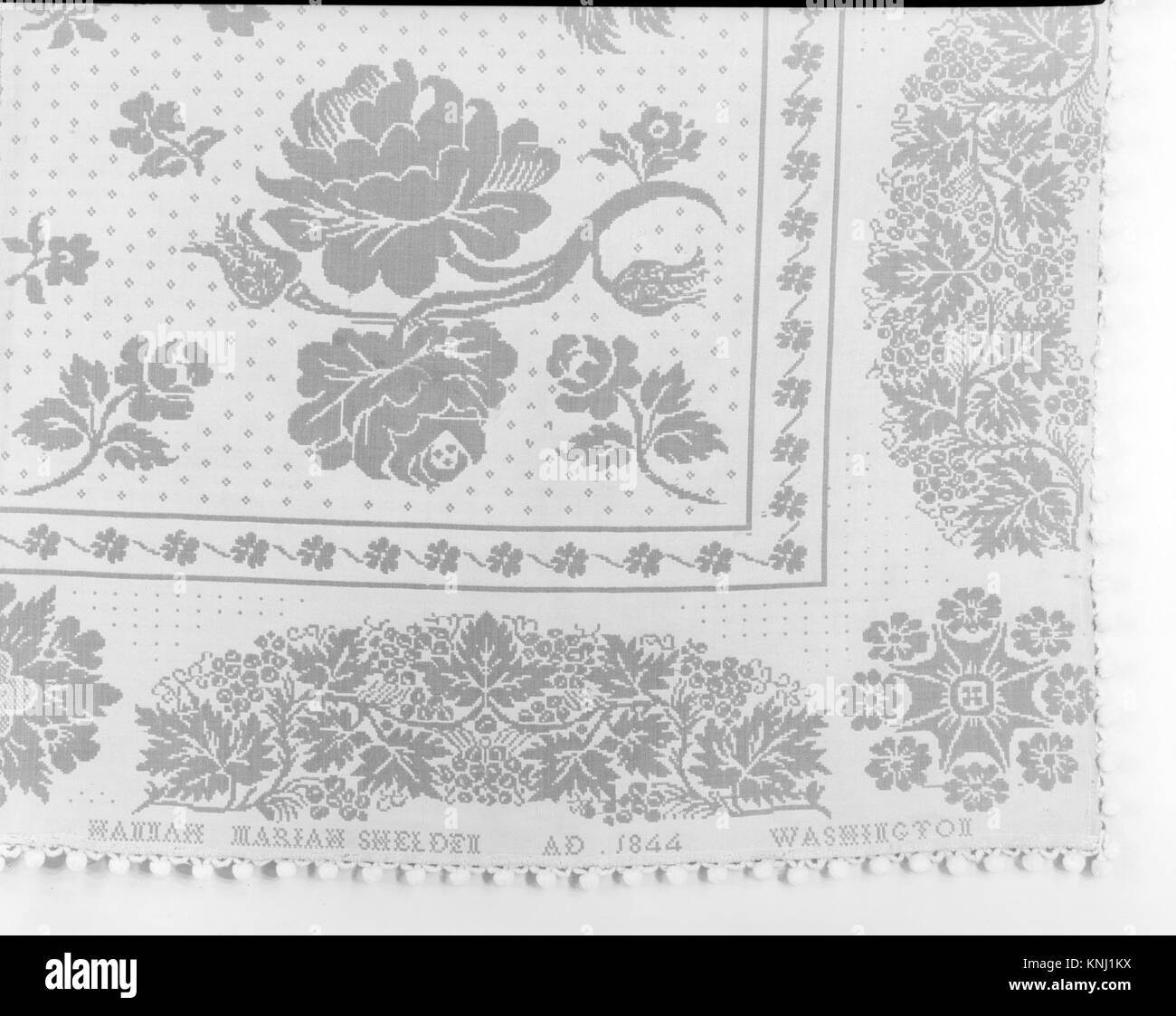 A coverlet from the Metropolitan Museum collection shown in a book ...