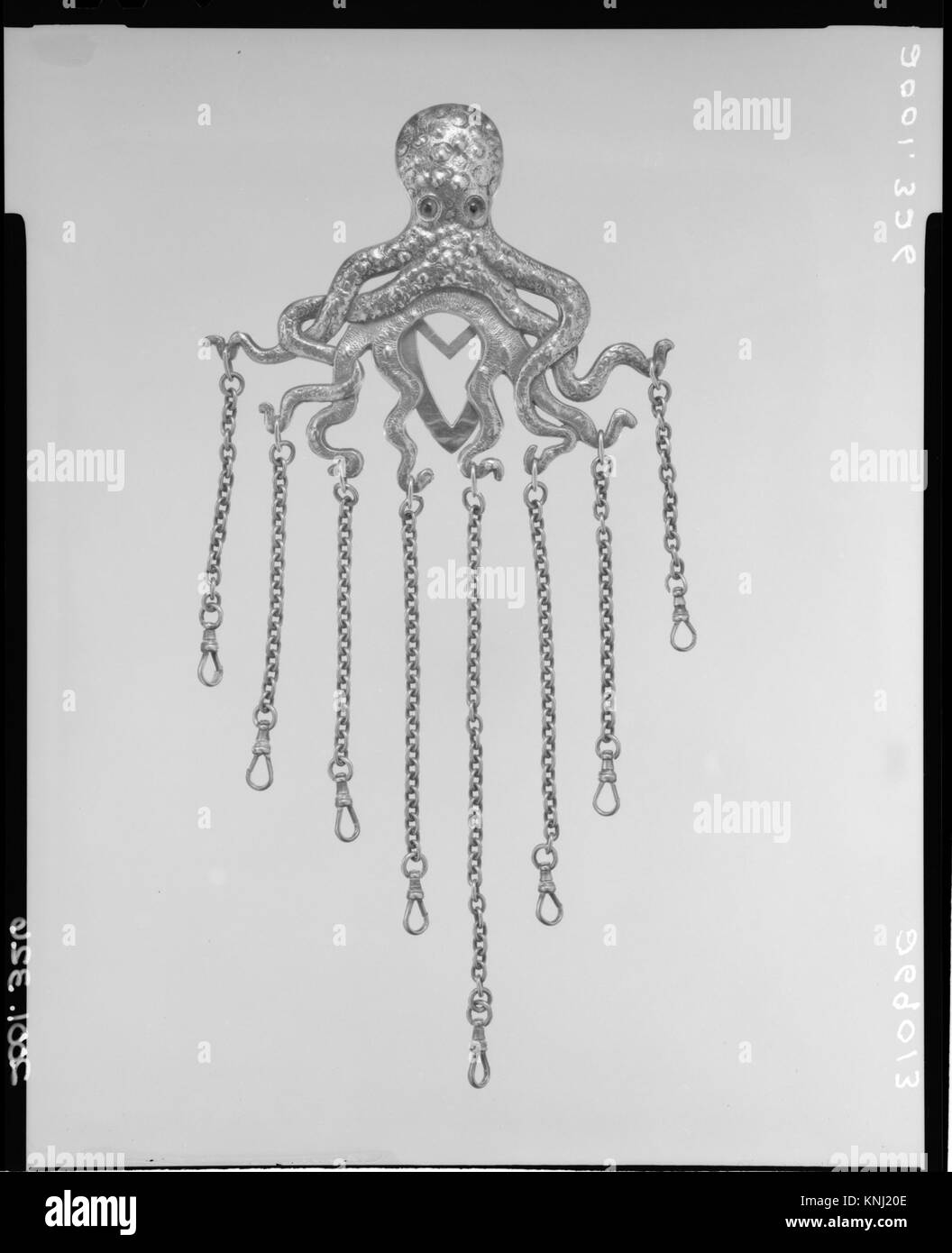 This chatelaine is a decorative accessory worn at the waist, typically ...