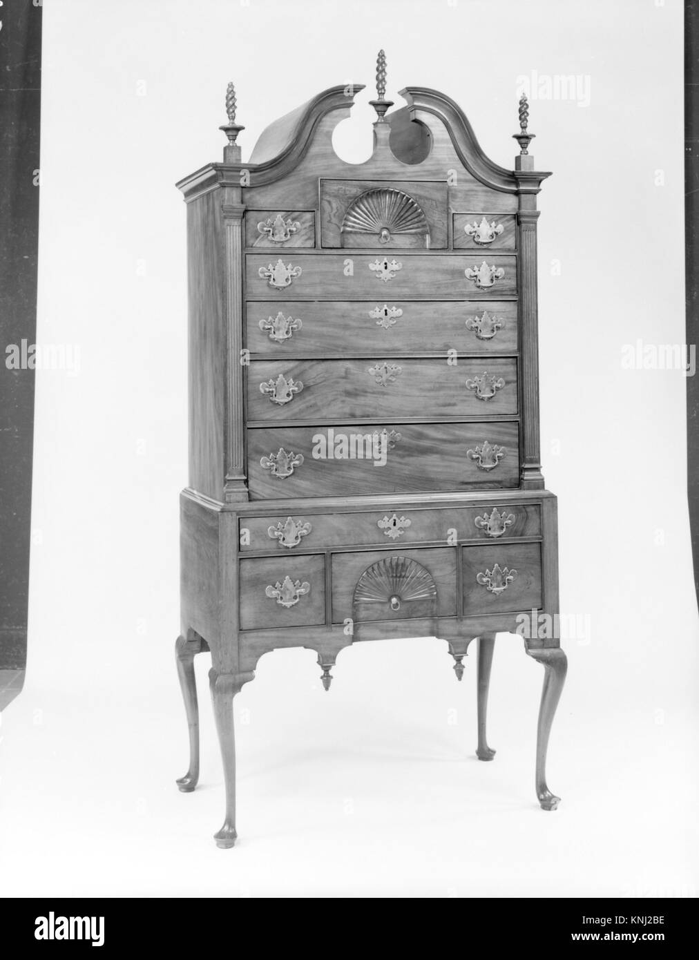 This chest of drawers features detailed woodwork and functional design ...