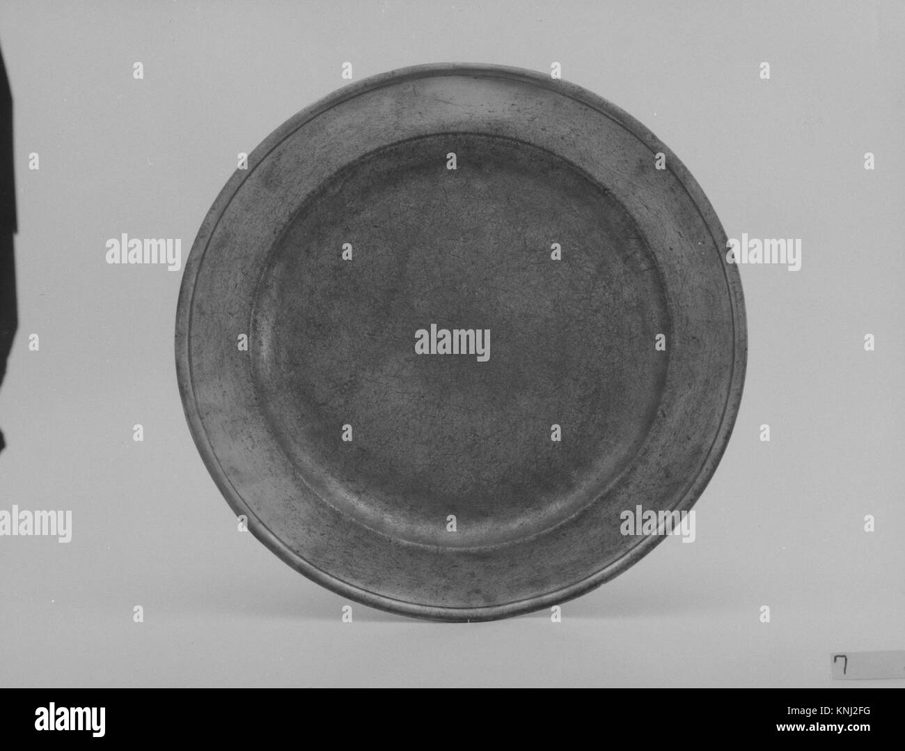 This dish, crafted from ceramic, represents the practical and ...