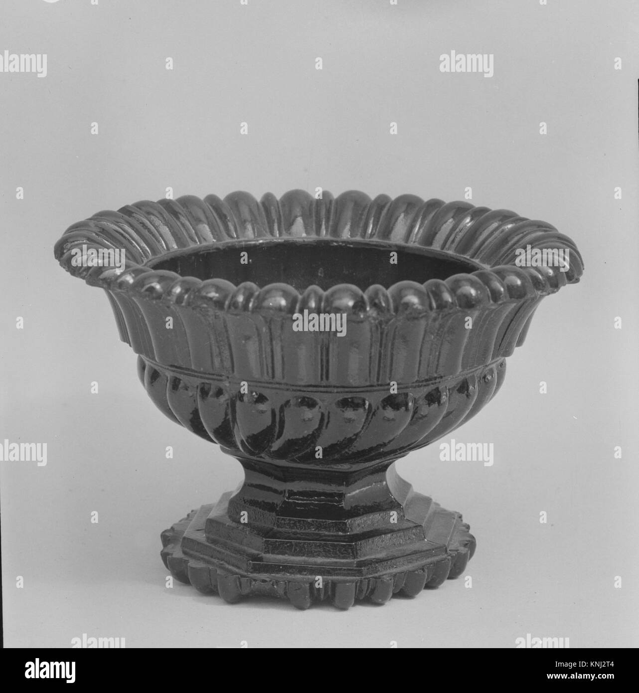 This lacy pressed glass bowl, dating from around 1850, showcases the ...