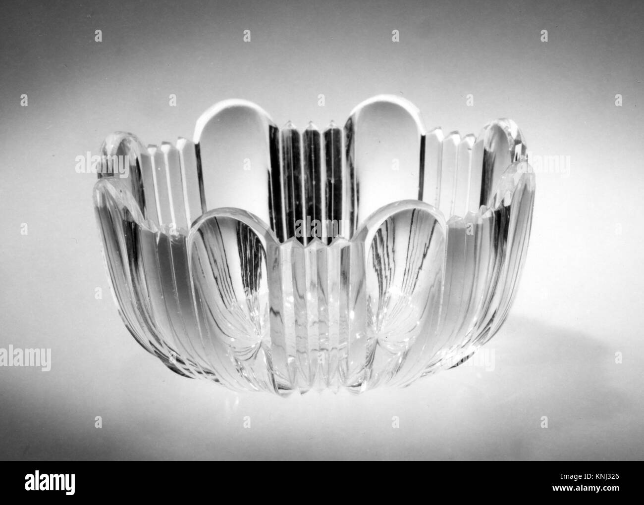 This finger bowl is a delicate piece of glassware, often used for ...