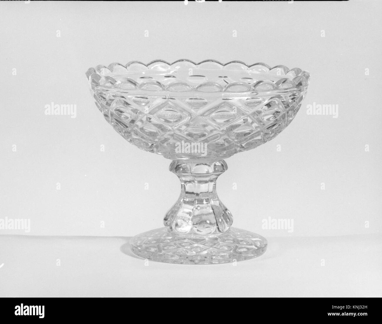 This American pressed glass compote, dated to the mid-19th century ...