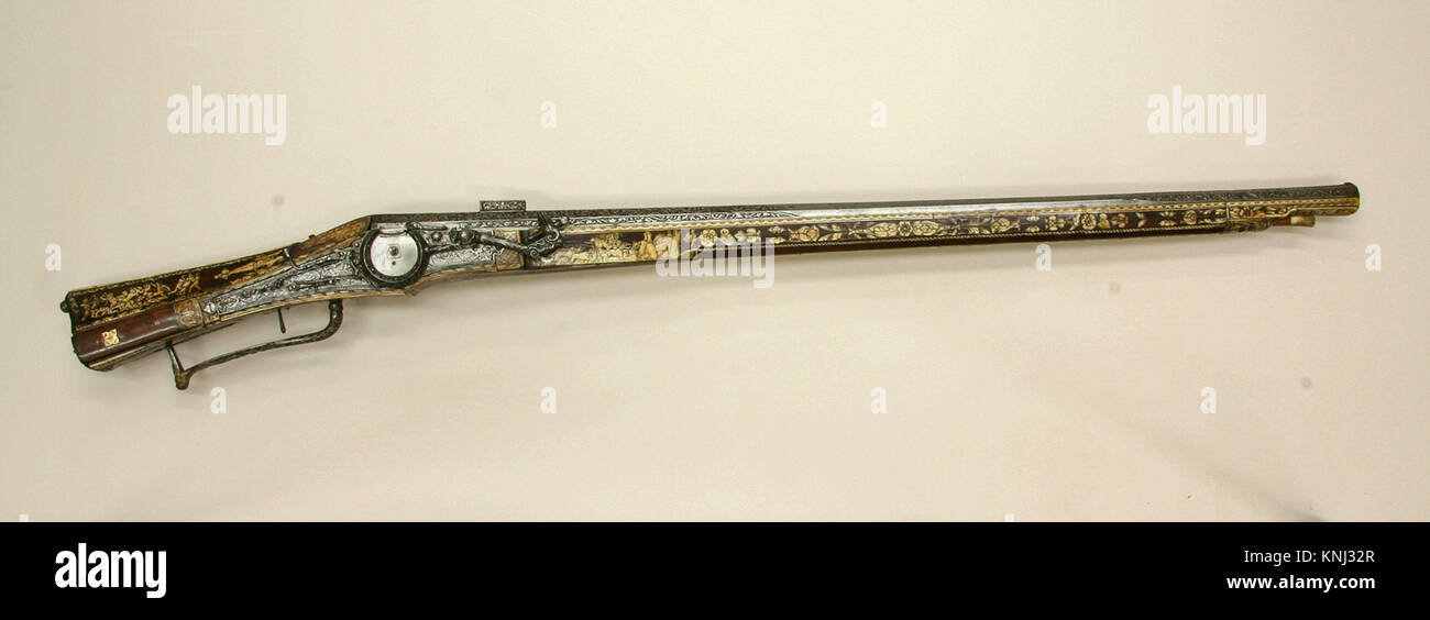 This firearm, combining both wheellock and matchlock mechanisms ...