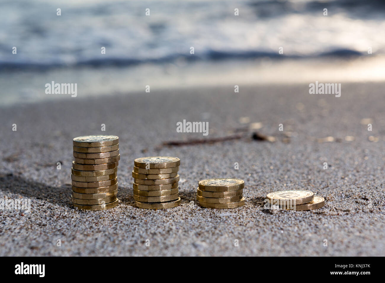 Picture of four piles British pound coins. UK Money, New Pounds in a ...