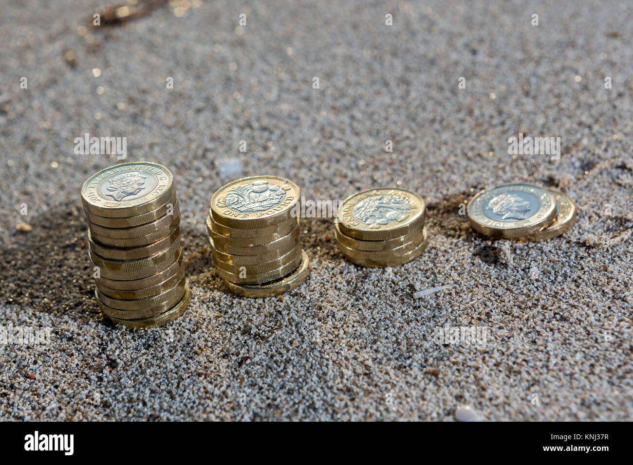 Picture of four piles British pound coins. UK Money, New Pounds in a ...