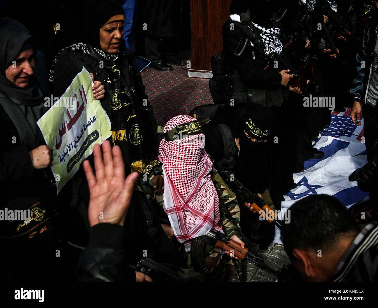 Gaza. 11th Dec, 2017. Armed female members of the militant Palestinian ...