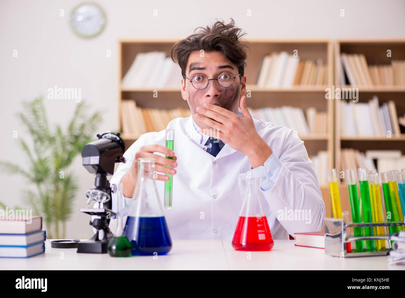 Mad crazy scientist doctor doing experiments in a laboratory Stock ...