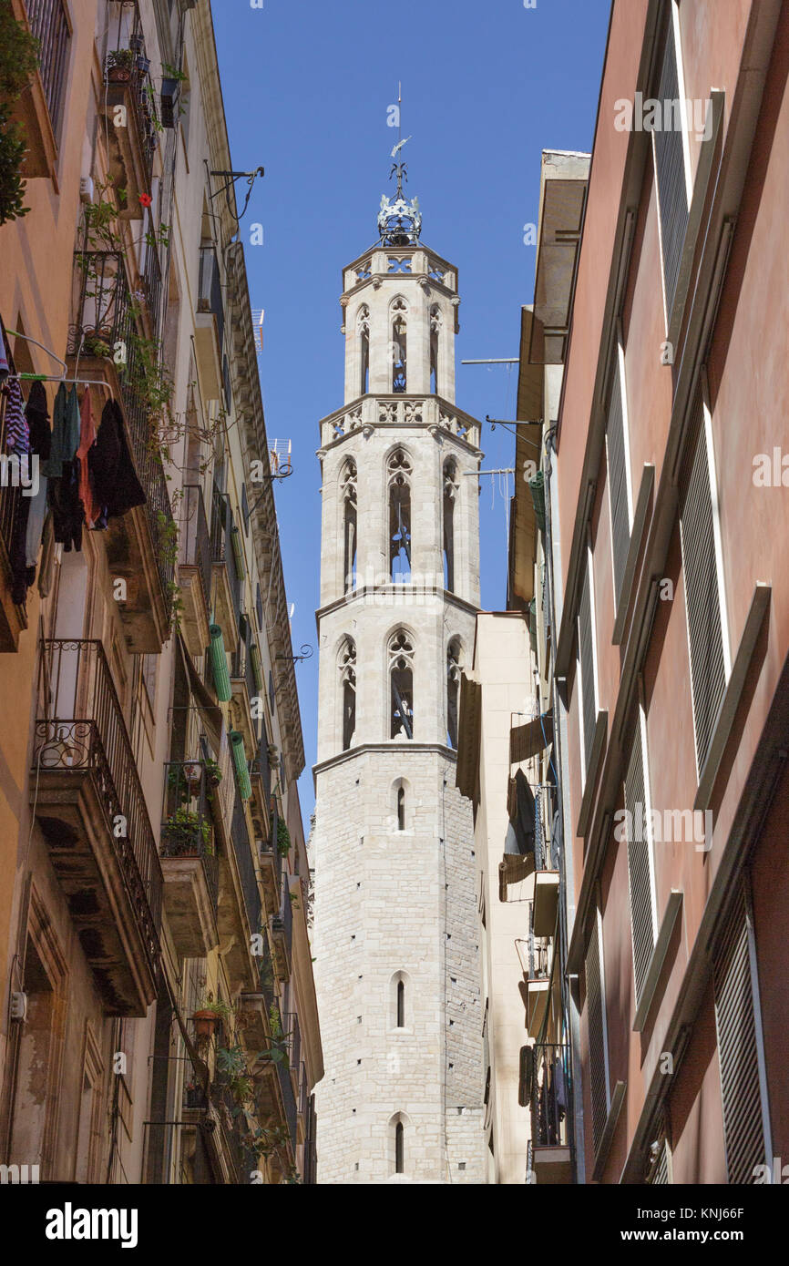 Stone Spanish Bell Tower Past Alleyway of Apartments Stock Photo - Alamy