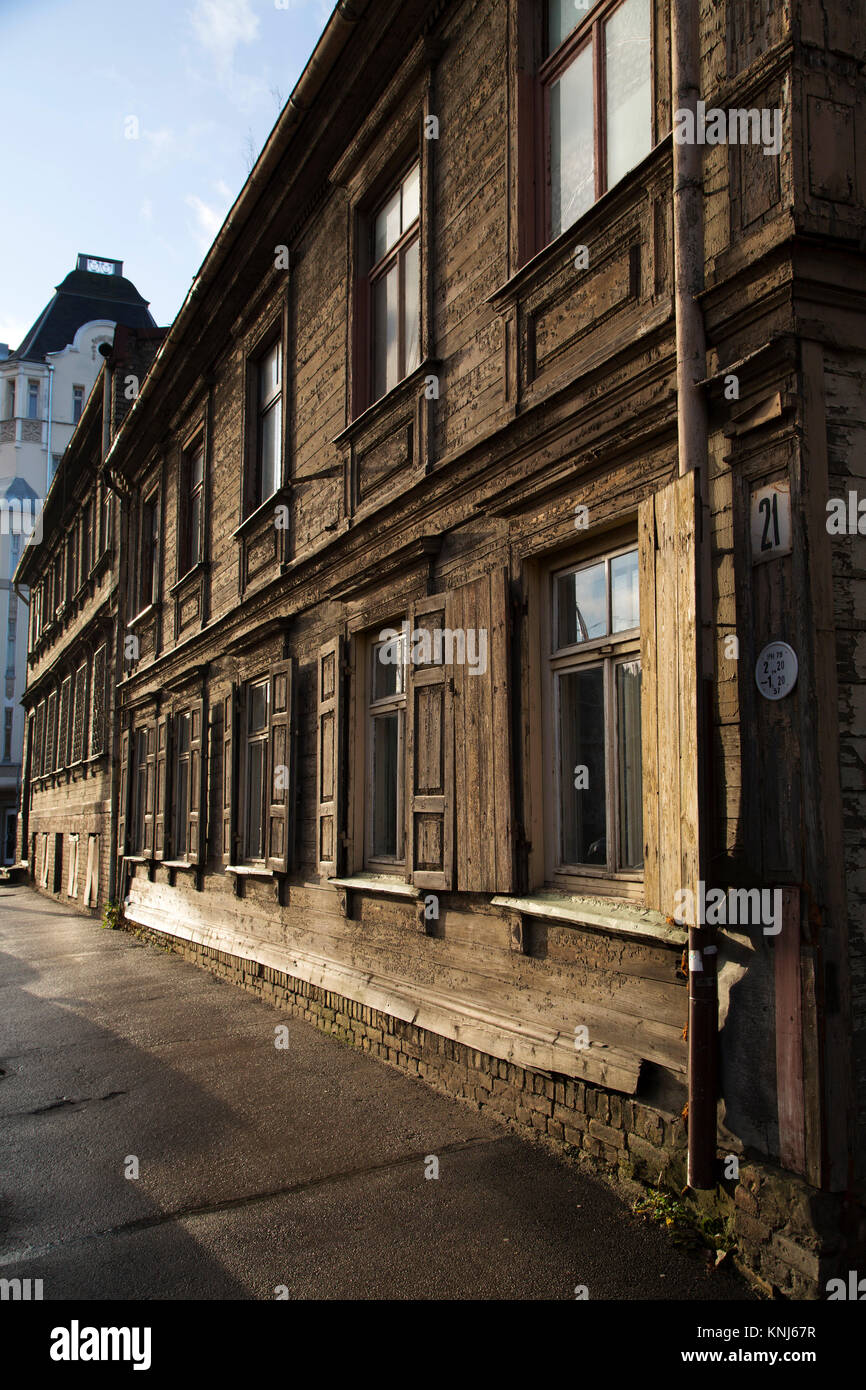 Window of a wooden house in Riga, Latvia. The building is painted green ...