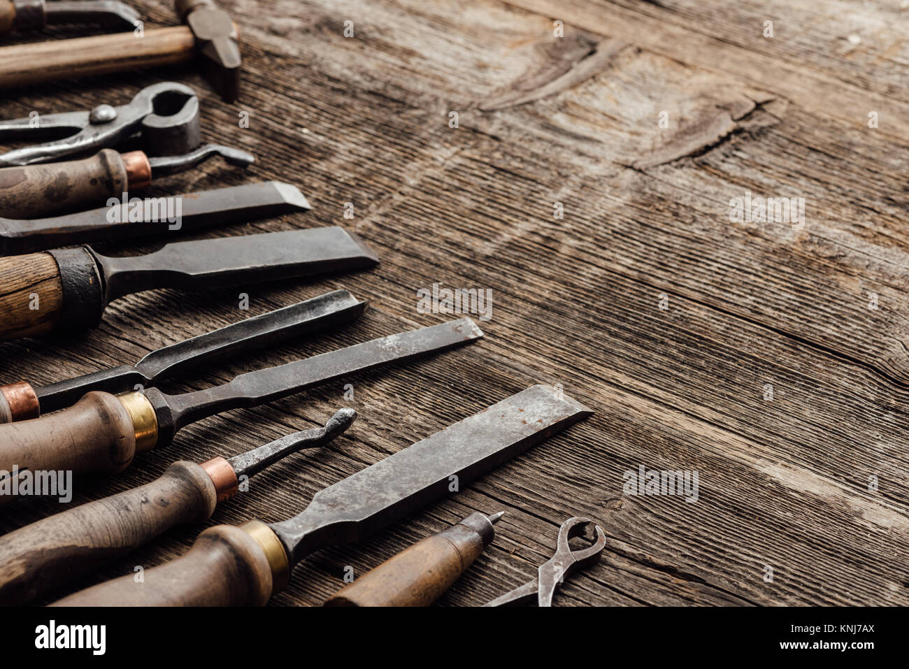 Old carving and woodworking tools on a vintage workbench: carpentry ...