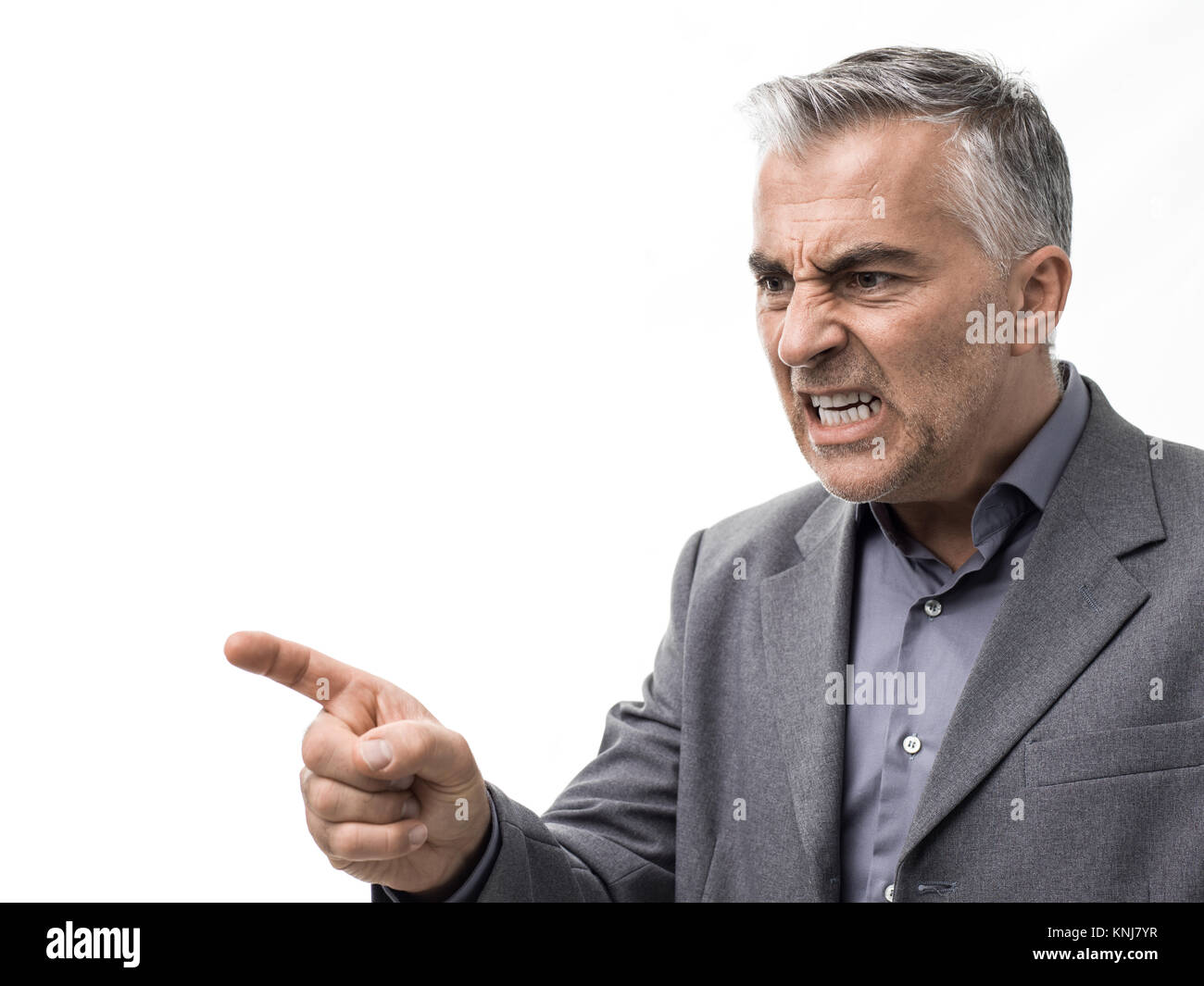 Aggressive angry boss giving a reprimand and arguing, he is pointing ...