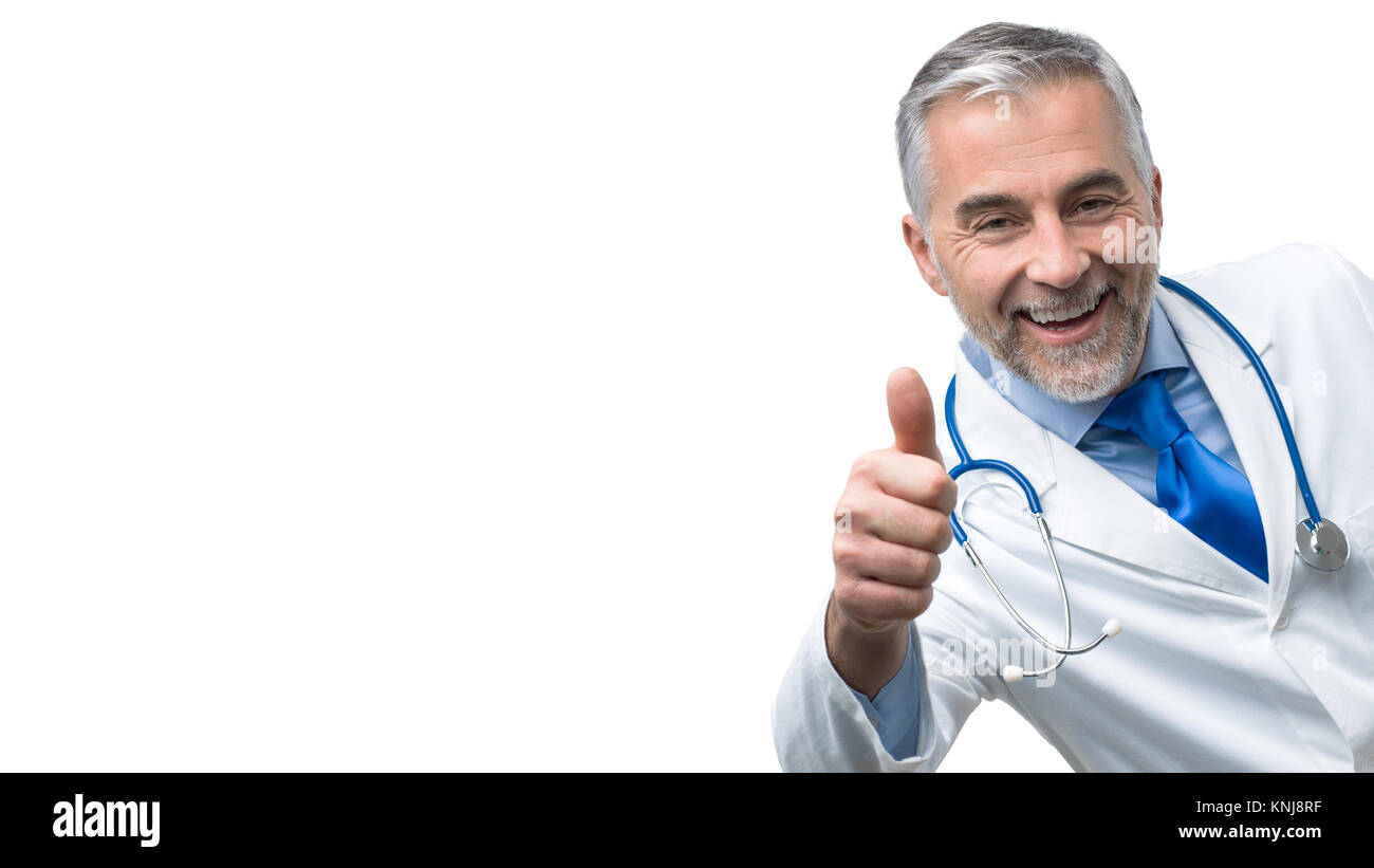 Thumbs up smiling confident doctor hi-res stock photography and images ...