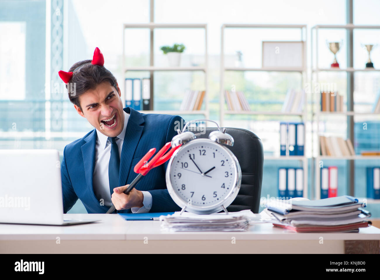 Devil angry businessman in the office Stock Photo - Alamy