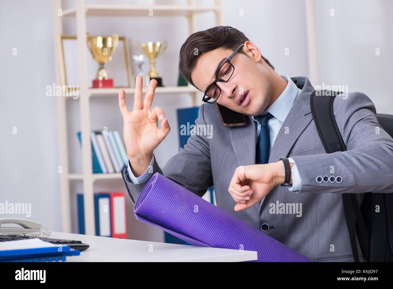 Young businessman rushing to sports gym during break Stock Photo - Alamy